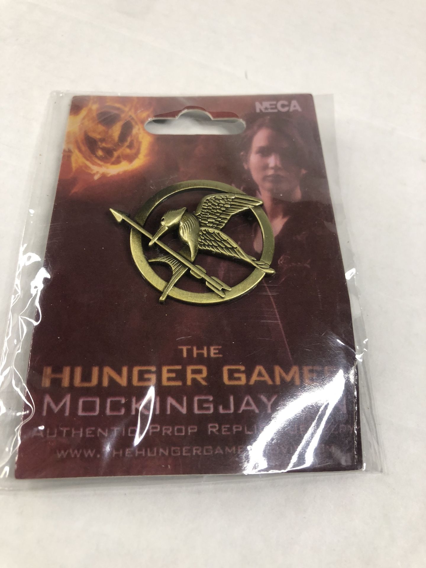 The Hunger Games Movie Mockingjay Prop Replica Pin for Sale in Atlanta ...