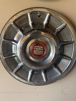 1957 cadillac hubcaps store