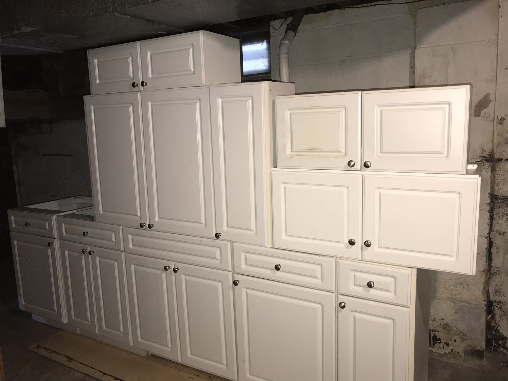 Merillat white kitchen cabinet set (12pieces ) with pantry. Sizes below ...