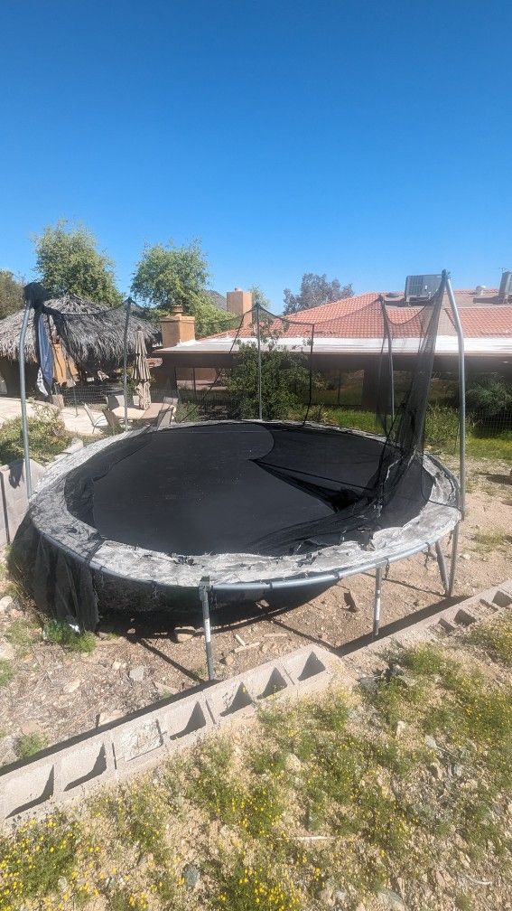 Free 15-ft Trampoline, Not Ripped Still Works for Sale in Phoenix, AZ ...