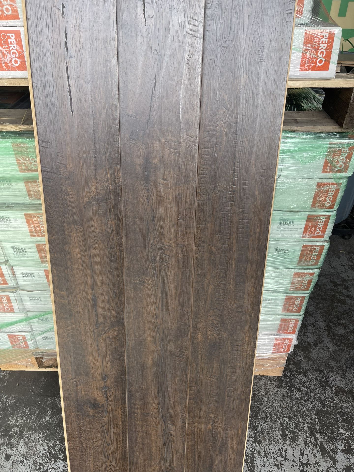 Java Scraped Oak 12 mm T x 6.1 in. W Waterproof Laminate Wood Flooring ...