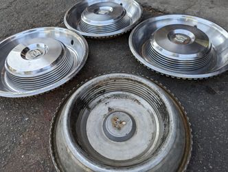 1965 cadillac hubcaps store