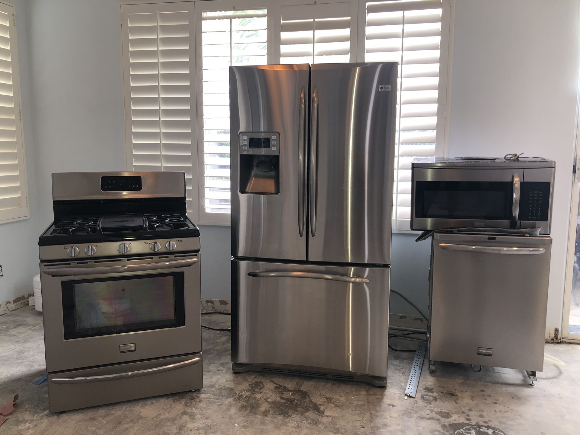 Complete Kitchen Appliance Set - Refrigerator, Range, Dishwasher, And ...