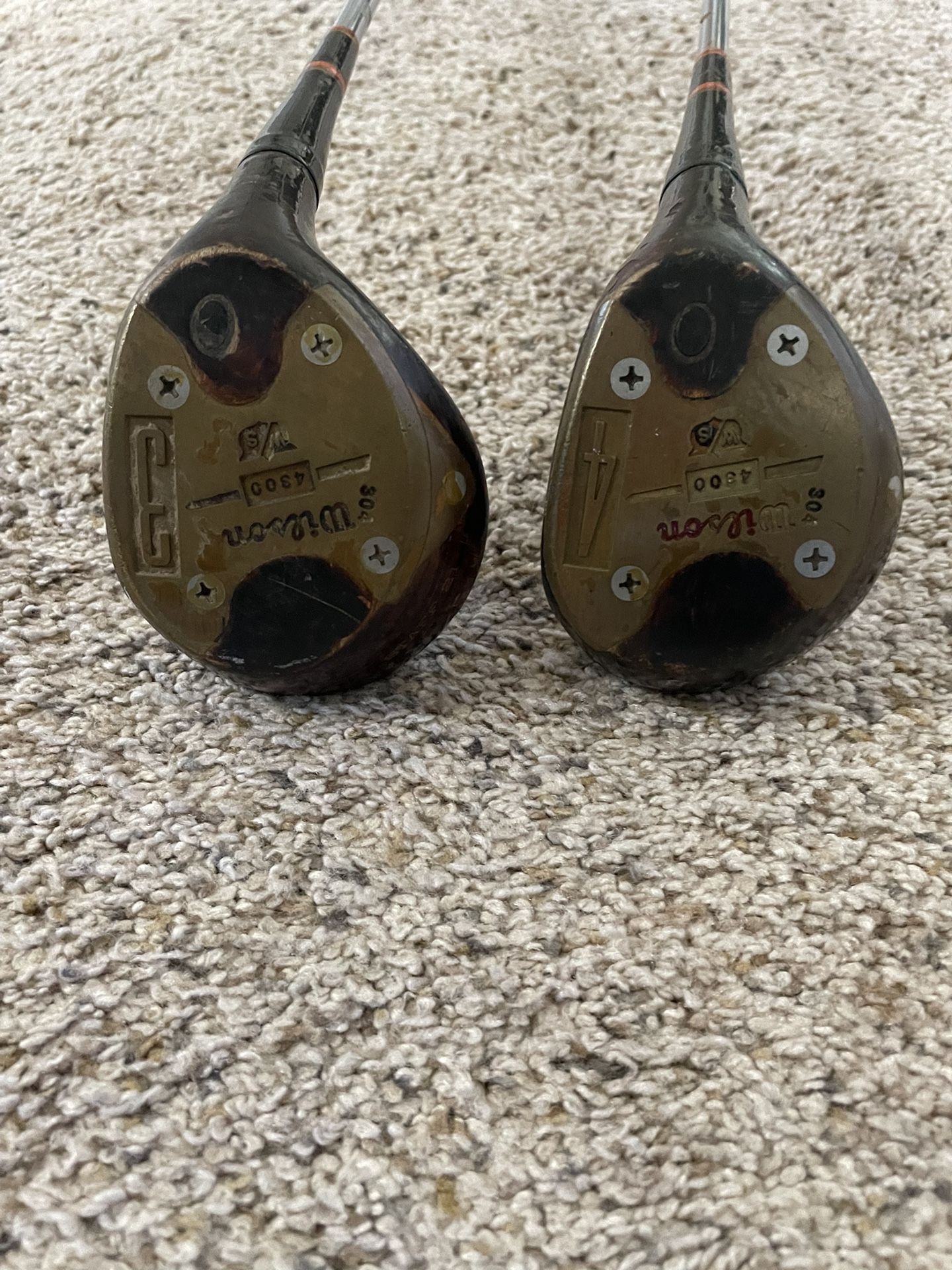 3 Vintage Persimmon golf clubs- Driver is Spalding and 3 and 4 wood are ...