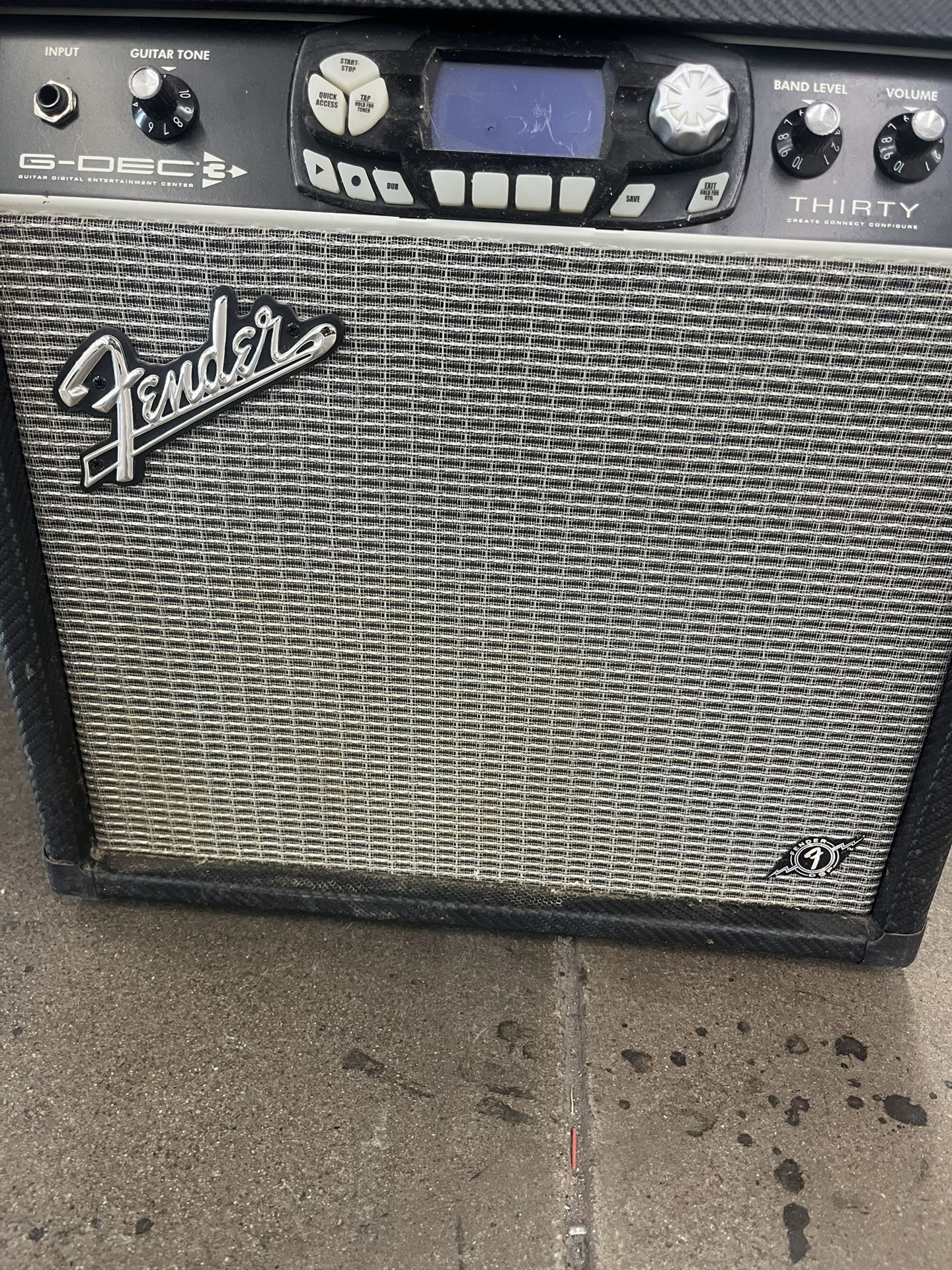 This is a Fender G-DEC 3 Thirty 30-watt 1x10" guitar combo amplifier ...