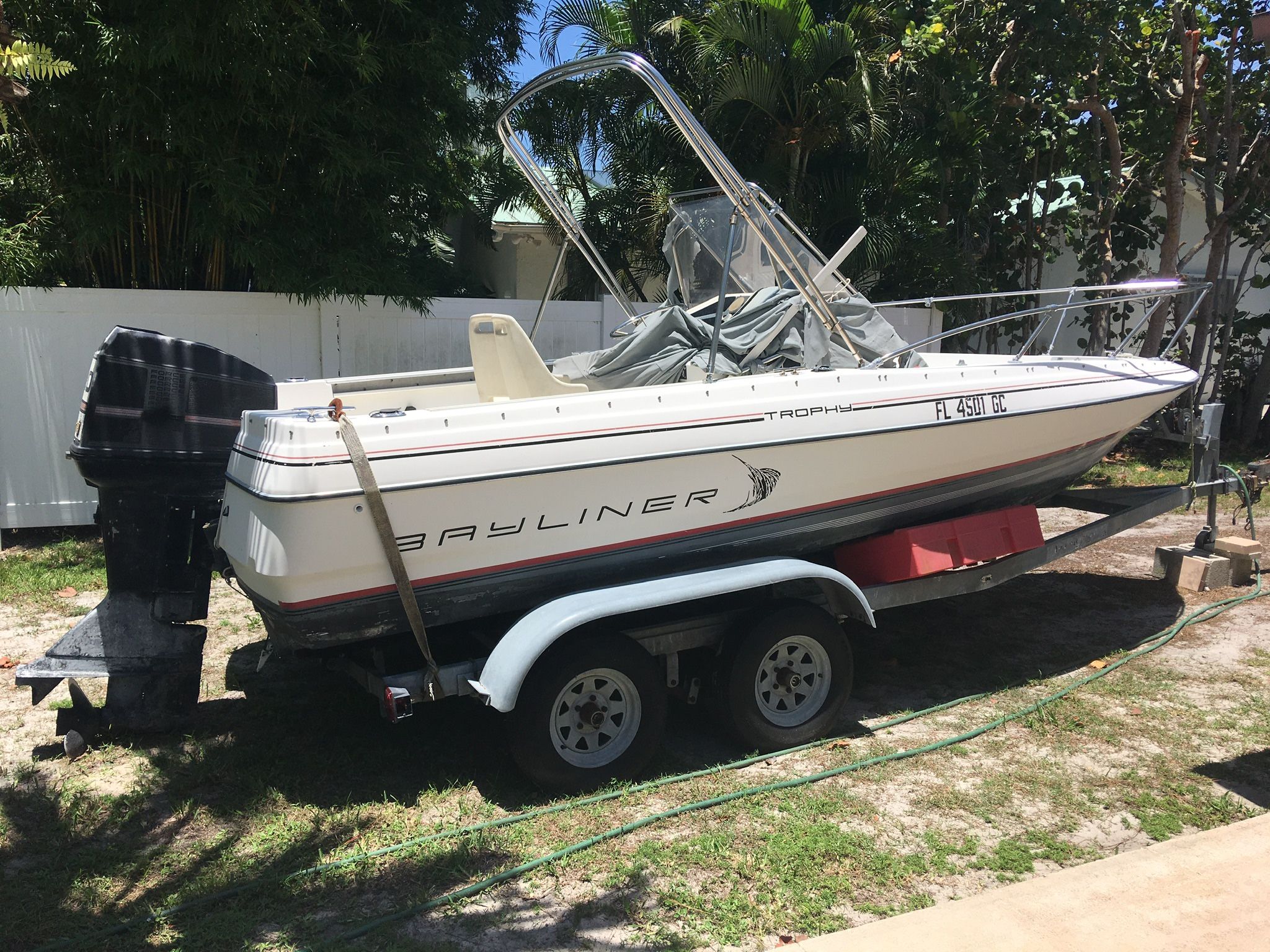 20 foot Bayliner center console 120 outboard motor float on dual axle ...