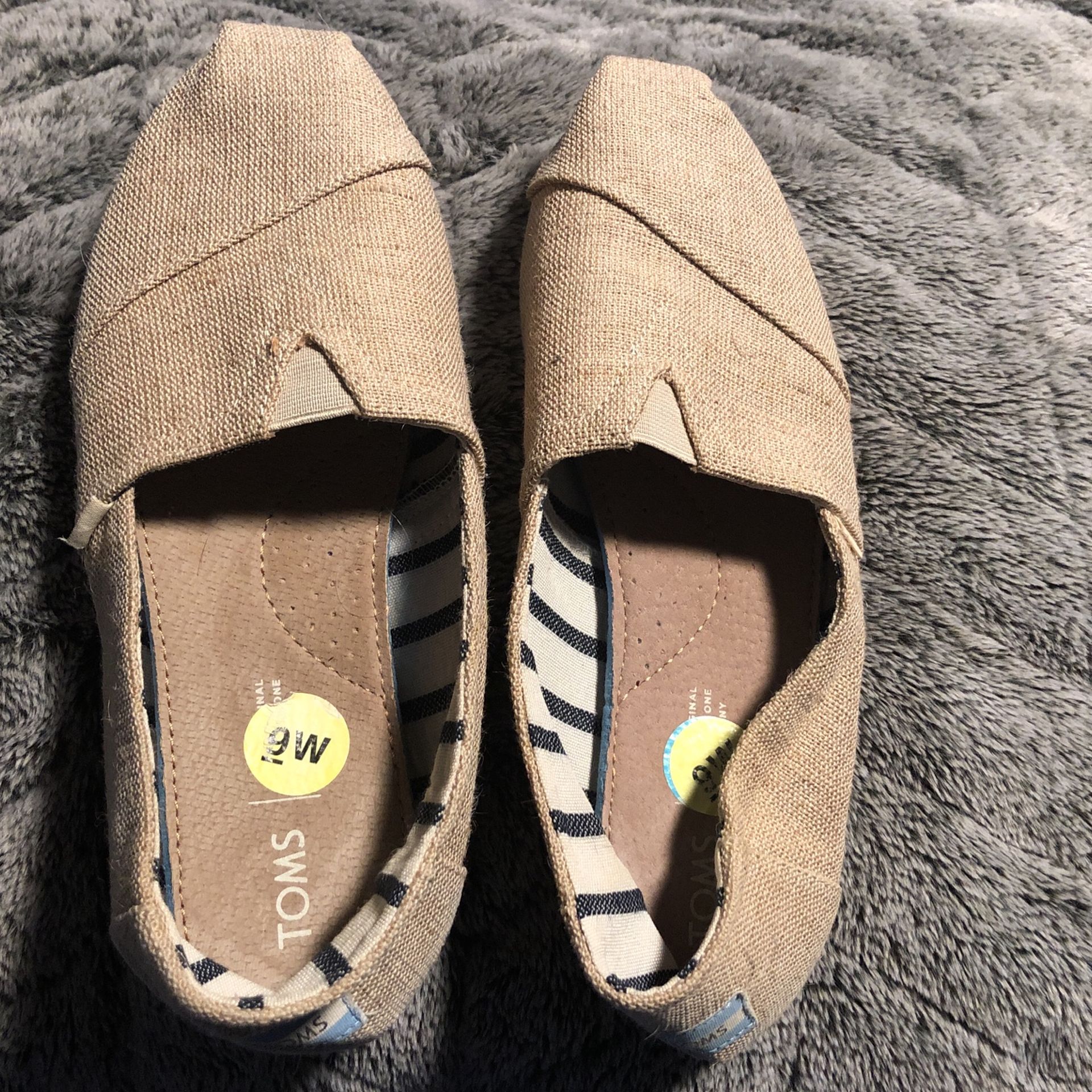 Wearing Toms Shoes