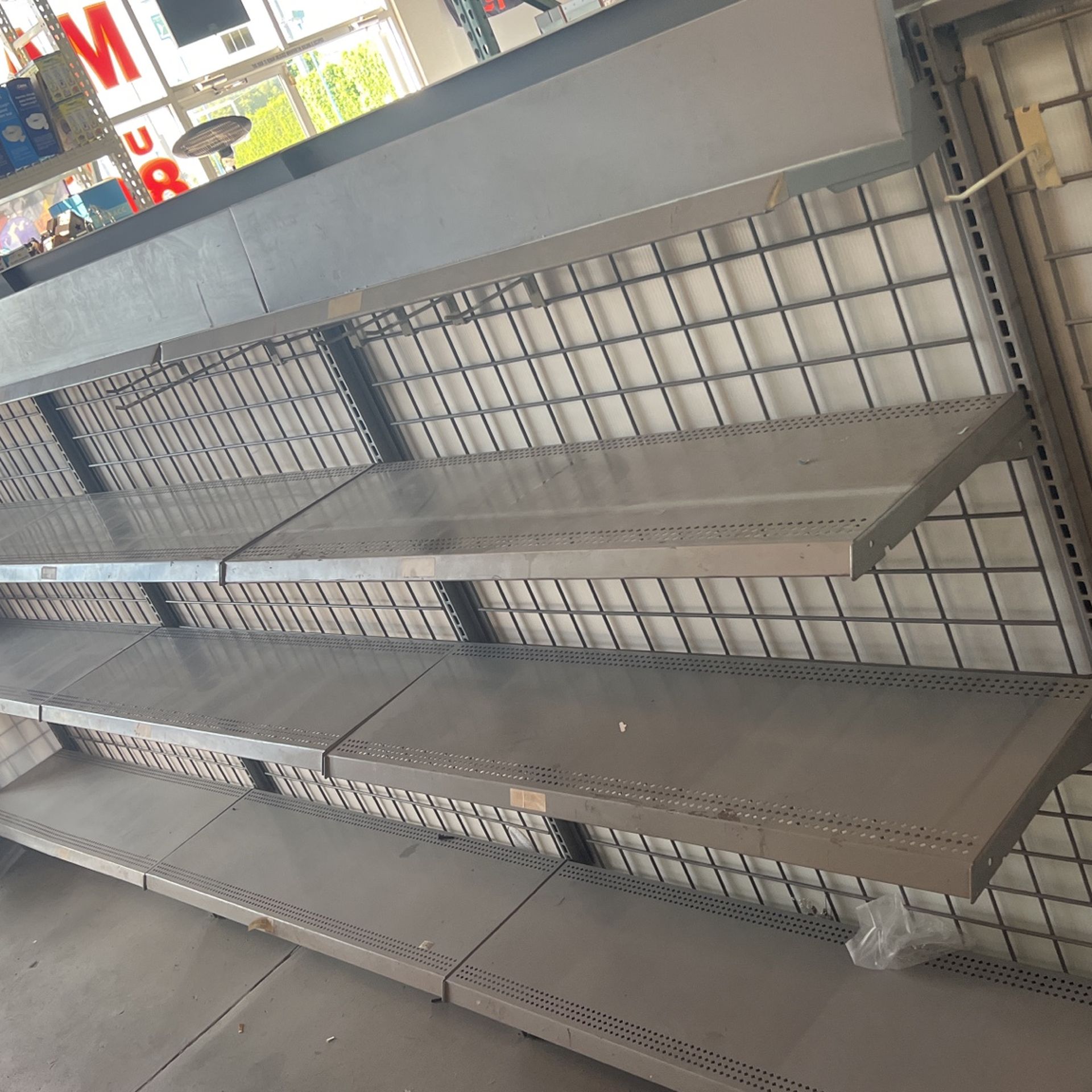 24 foot awesome display rack with grid wall baskets shelves and hooks ...