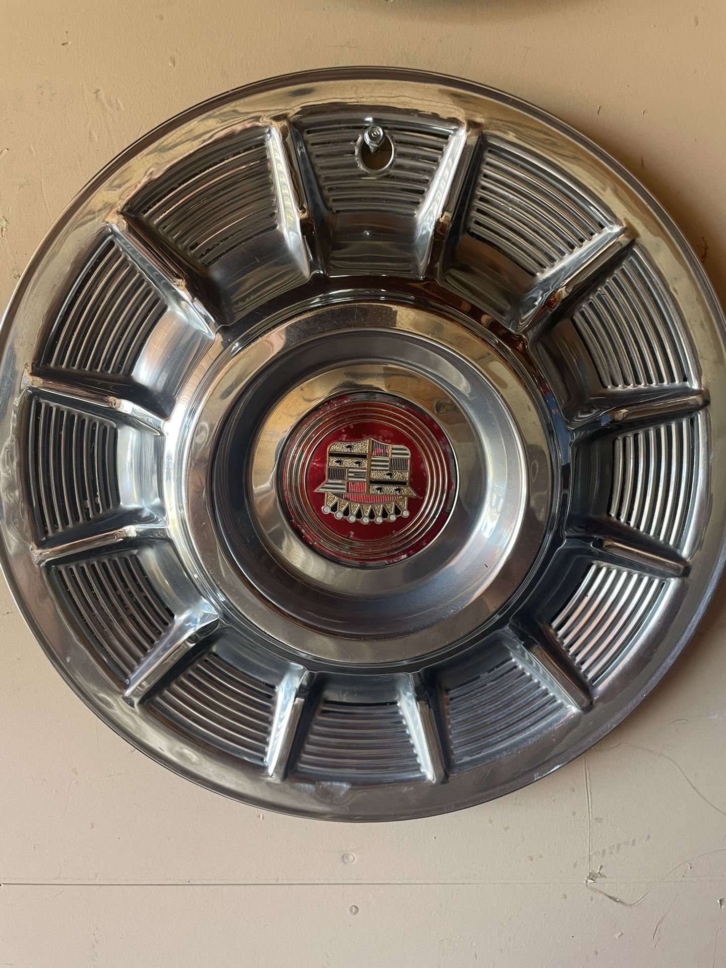 57 cadillac hubcaps store
