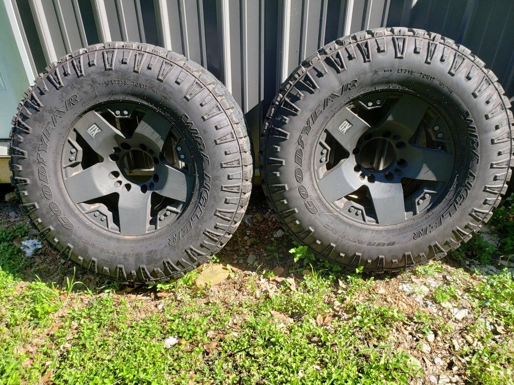 Need gone asap! Price reduced 35x12.5x17 Goodyear Wrangler Duratrac mounted on 17" KMC rockstar ...