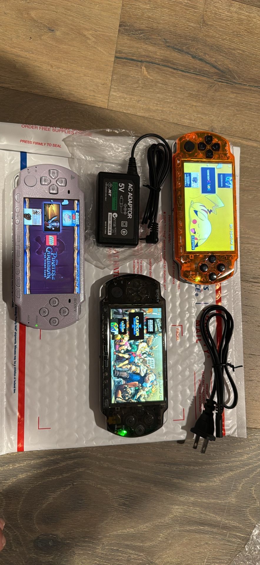Modded Sony PSP 2000 @ 3000 With 128Gb Sd Card And 106 Games- N64, SNES ...