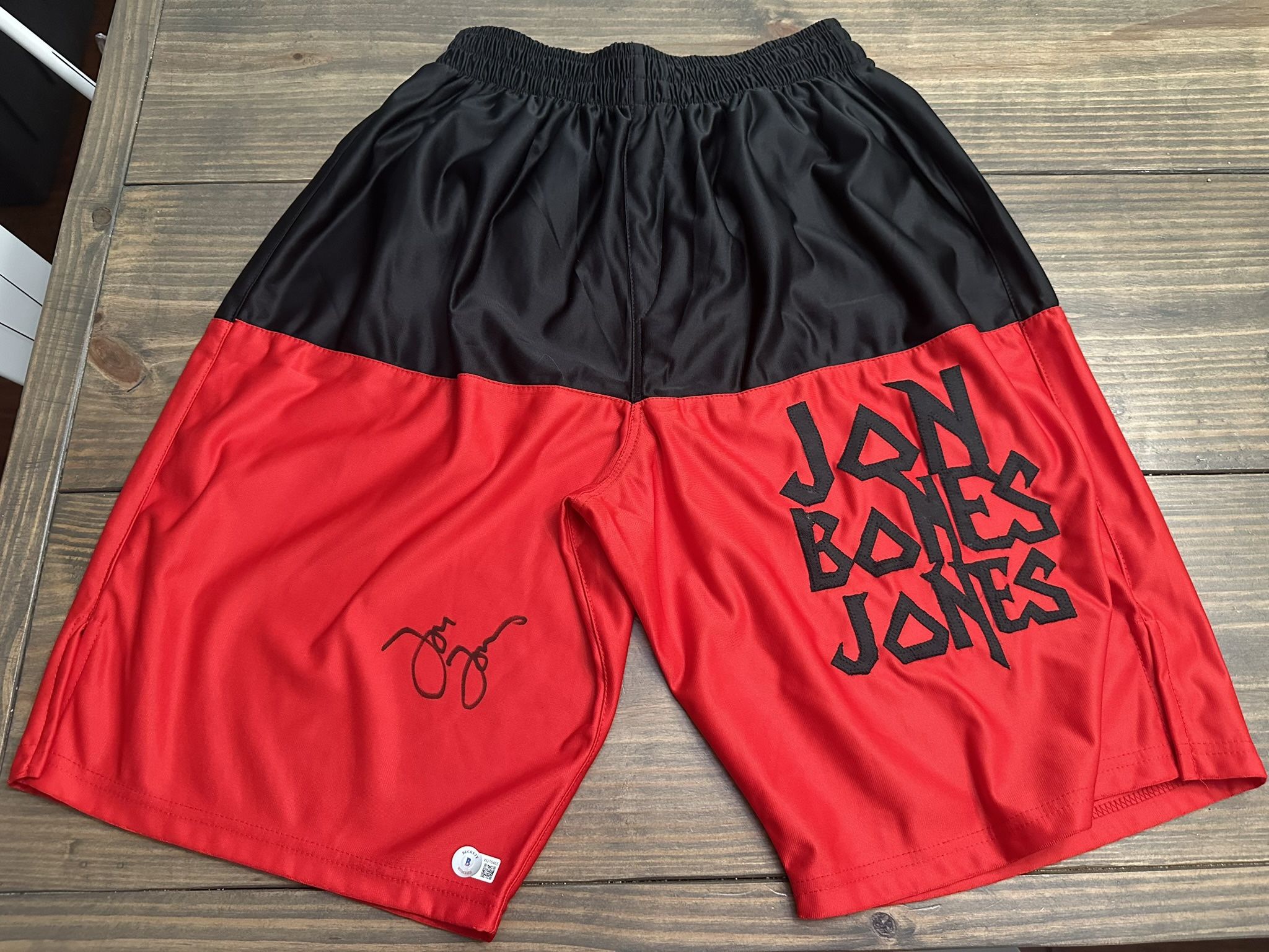 JON BONES JONES AUTOGRAPHED RED TRUNKS (BECKETT) for Sale in San ...