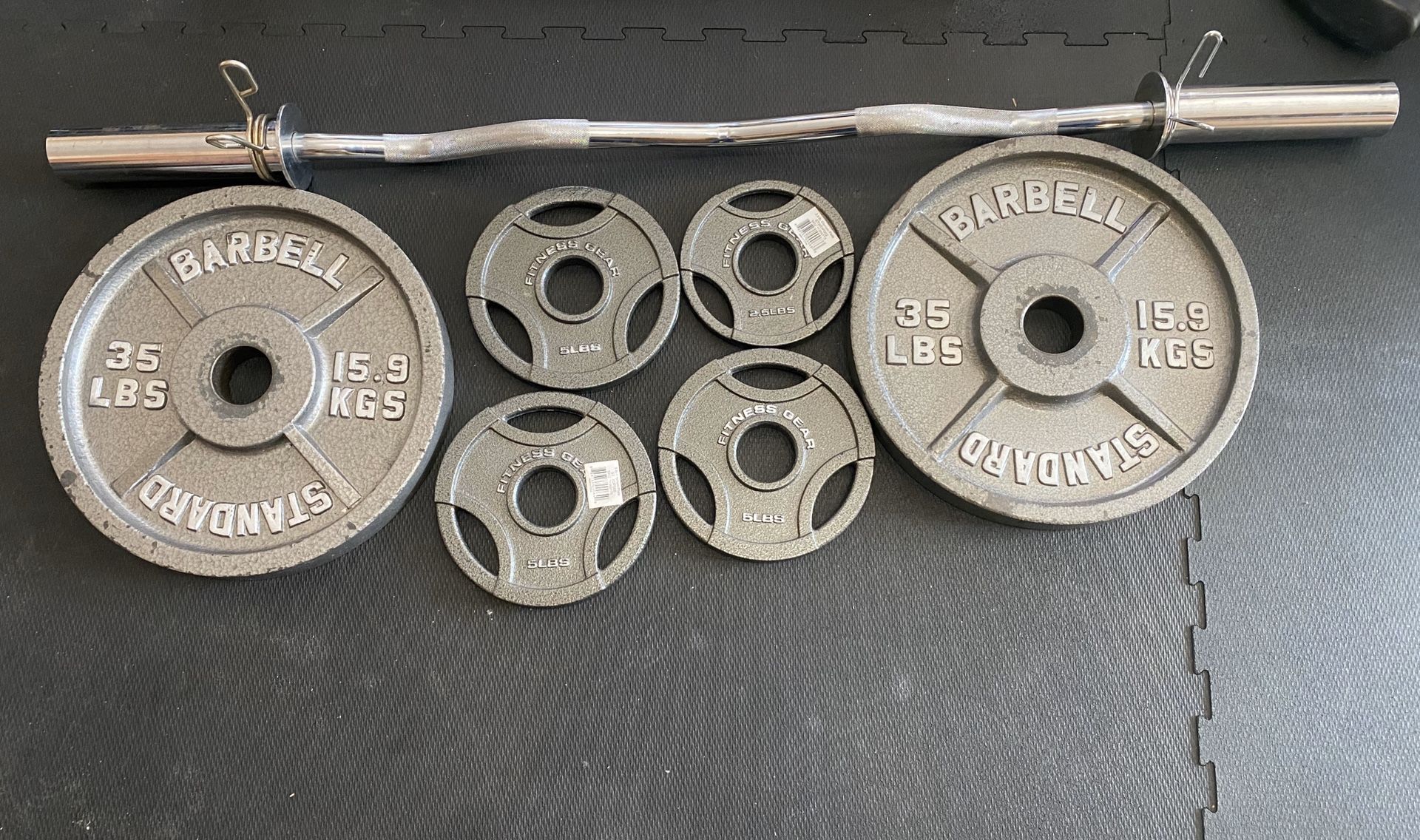$235 Olympic Curl Bar and 87.5 lbs Of weight plates $2 a pound for Sale ...
