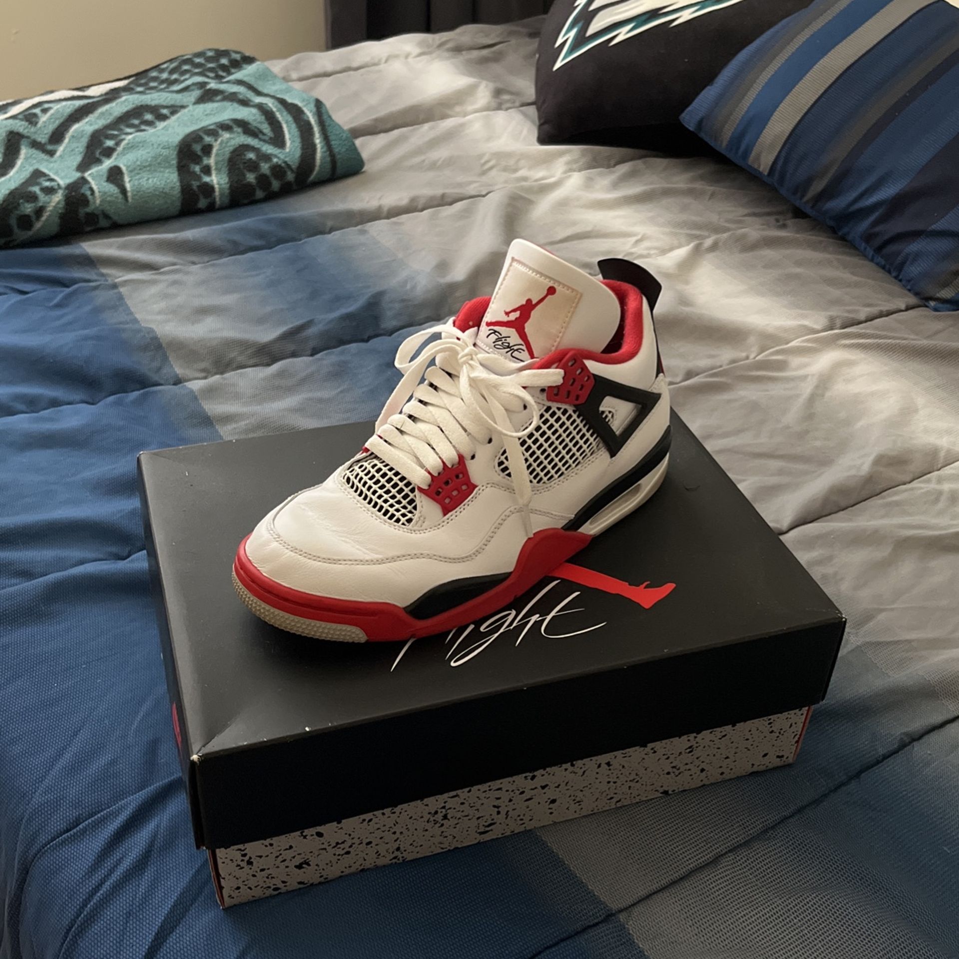 Jordan Retro 4 Fire Red On Feet