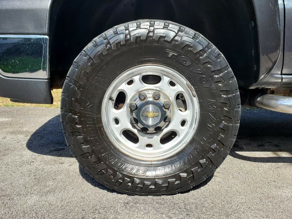 Silverado k2500 RIMS 8 Lug with TOYO Open Country MT tires for Sale in ...