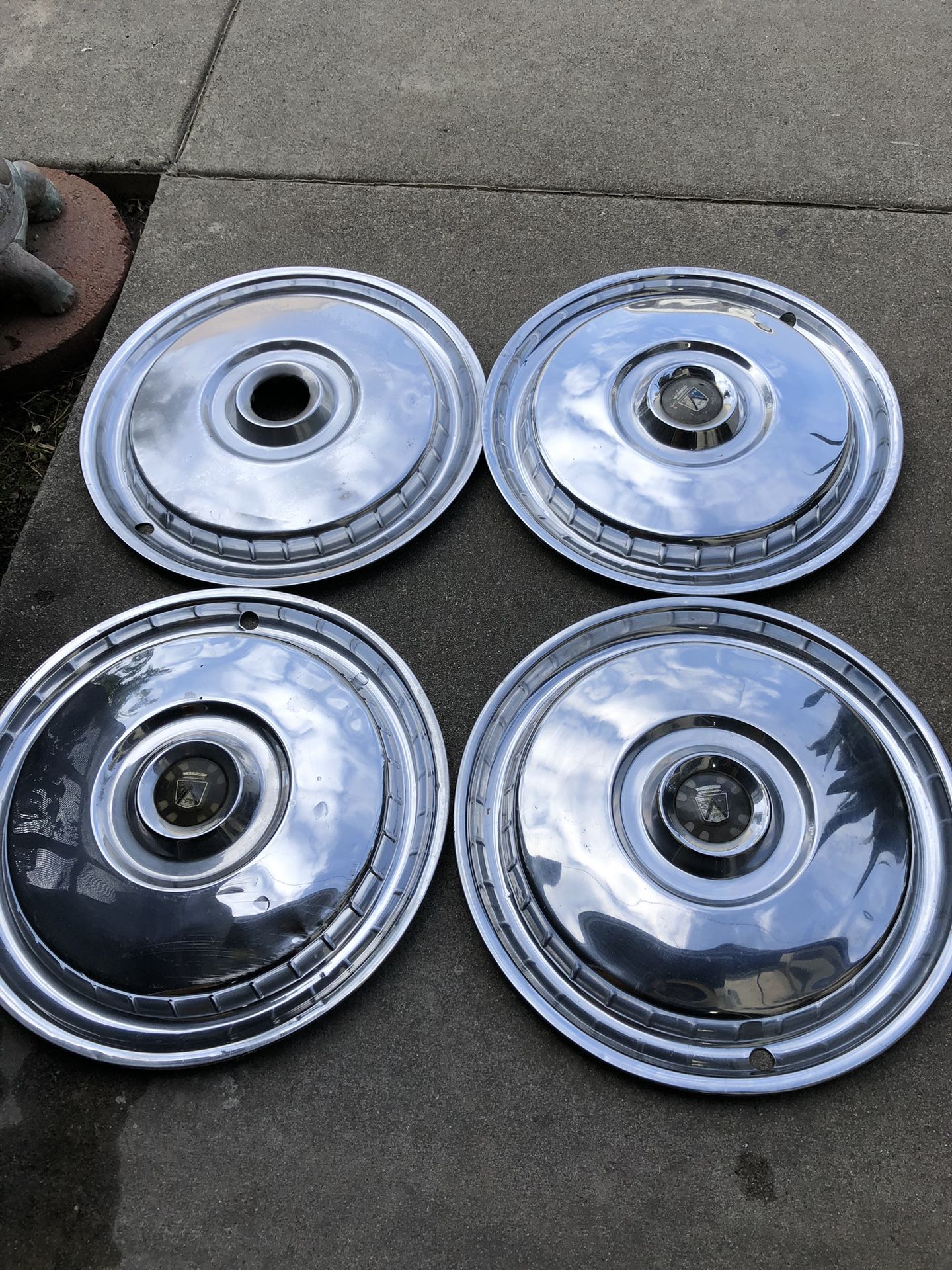 set of four vintage, 15-inch chrome hubcaps for the 1955–1956 Ford ...