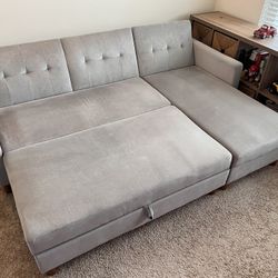 Cordell reversible sleeper sectional with ottoman store