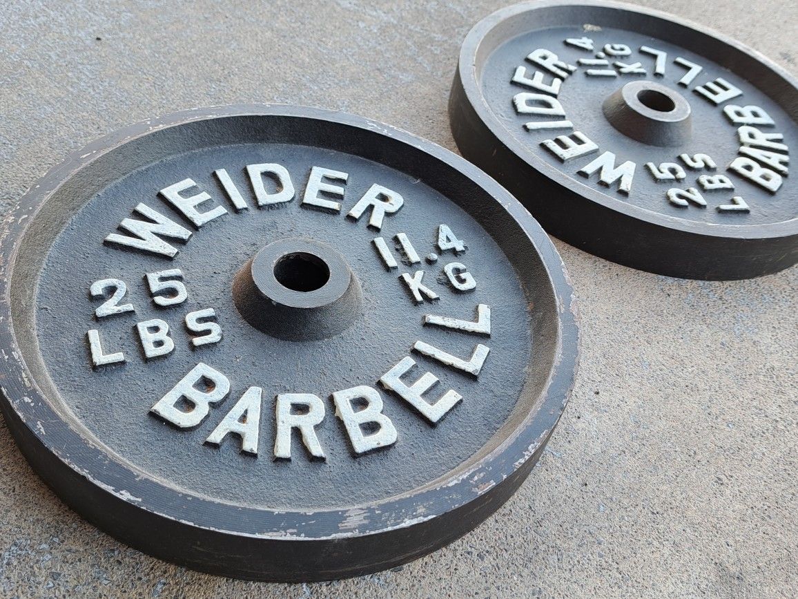WEIDER BARBELL PLATES 50LBS - 2 PLATES OF 25 LBS. EACH THE HOLE IS OF 1 ...