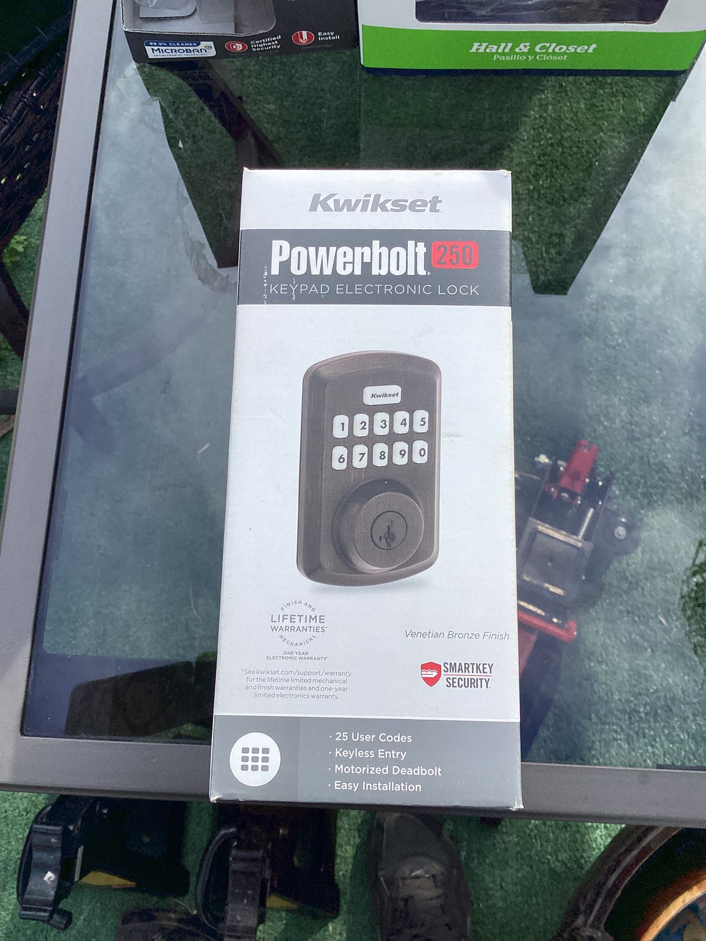 The item is a Kwikset Powerbolt 250 Keypad Electronic Lock in a ...