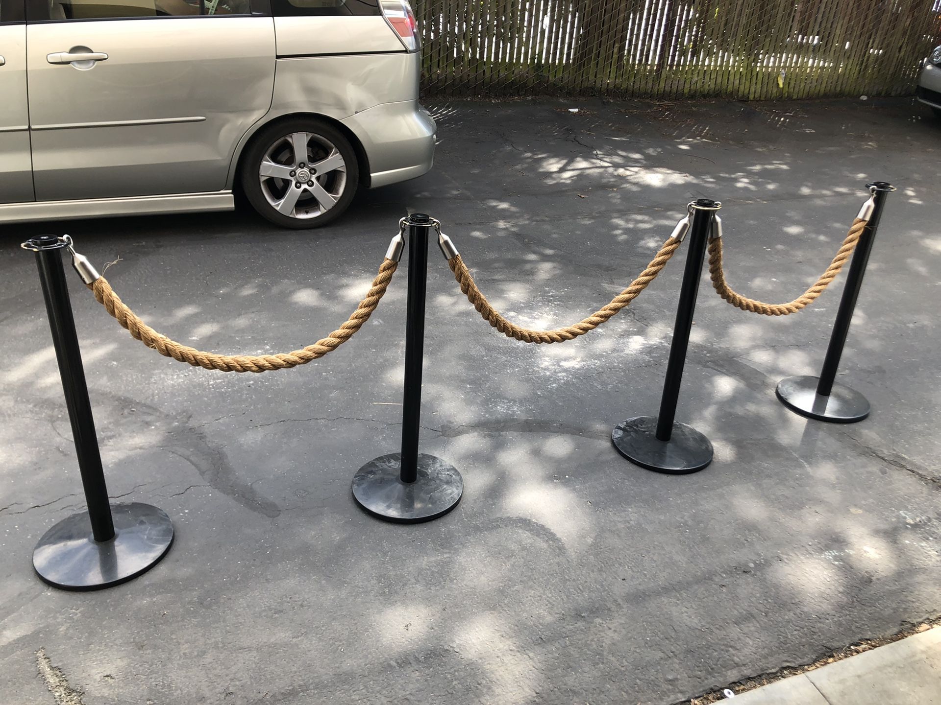 4 black Stanchions with rope for Sale in Seattle, WA - OfferUp