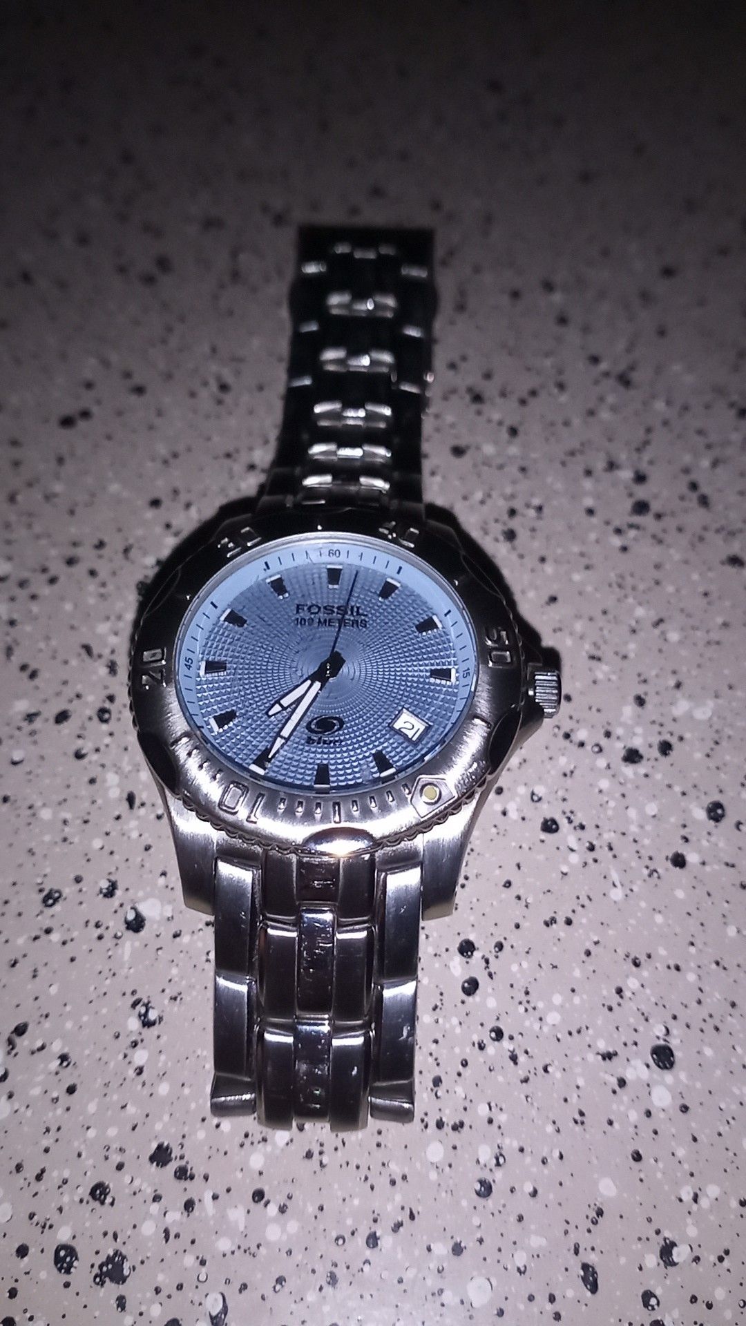 Fossil men's watch good light blue face silver very nice needs a ...