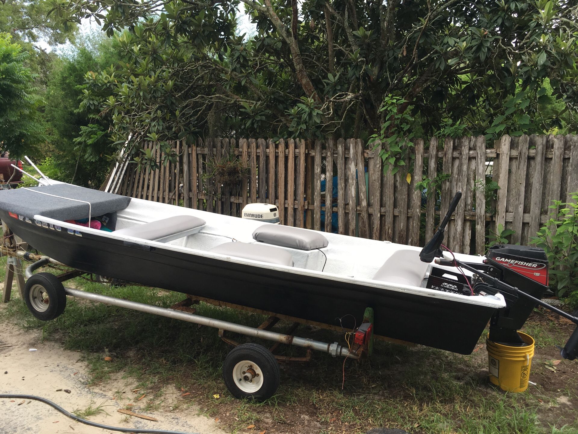 14 ft Fiberglass flat bottom boat with 15 hp gamefisher and 55 lbs ...