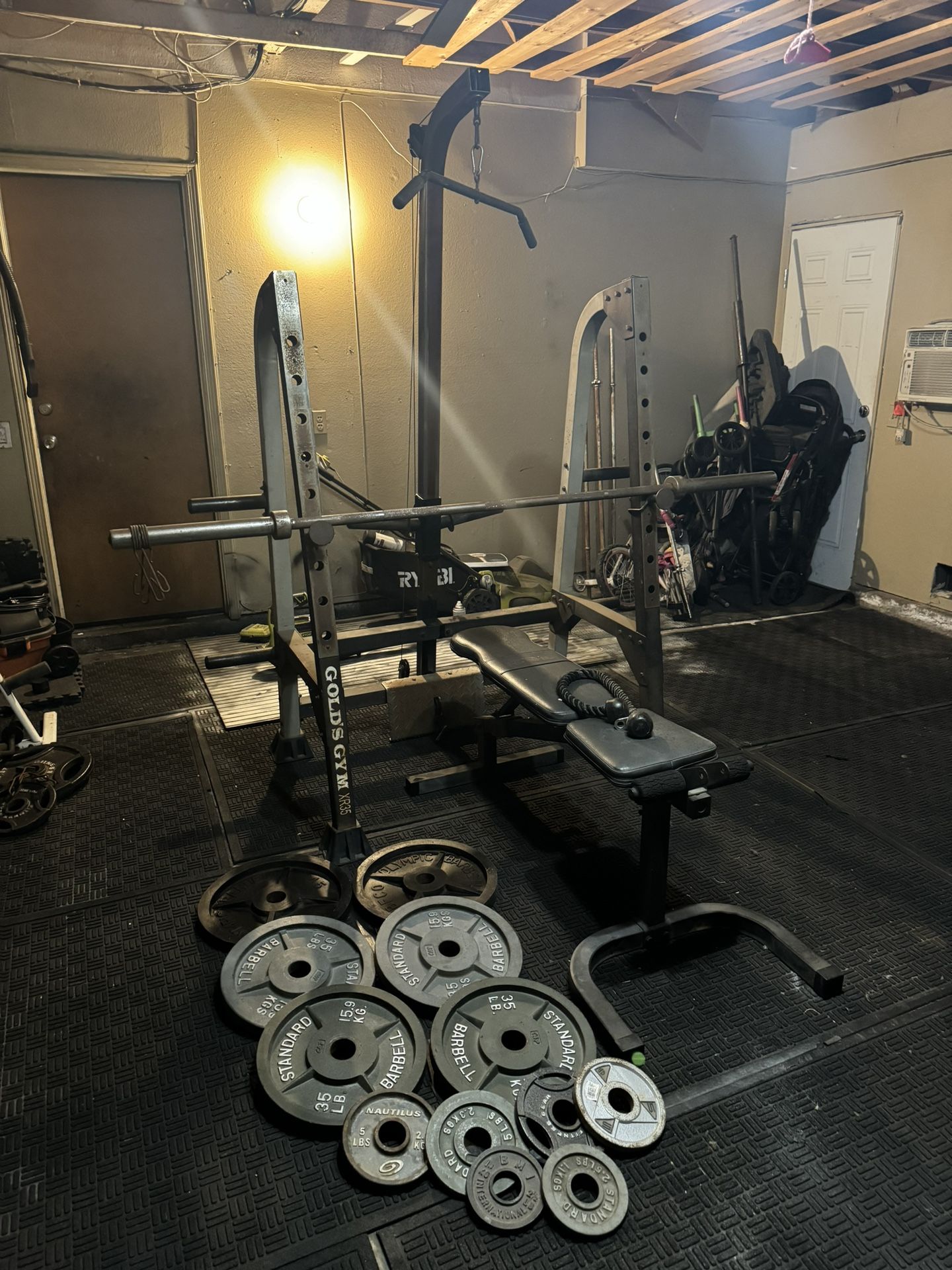 Bench press/squat rack with 7ft bar plus 255lbs of Olympic weights for ...