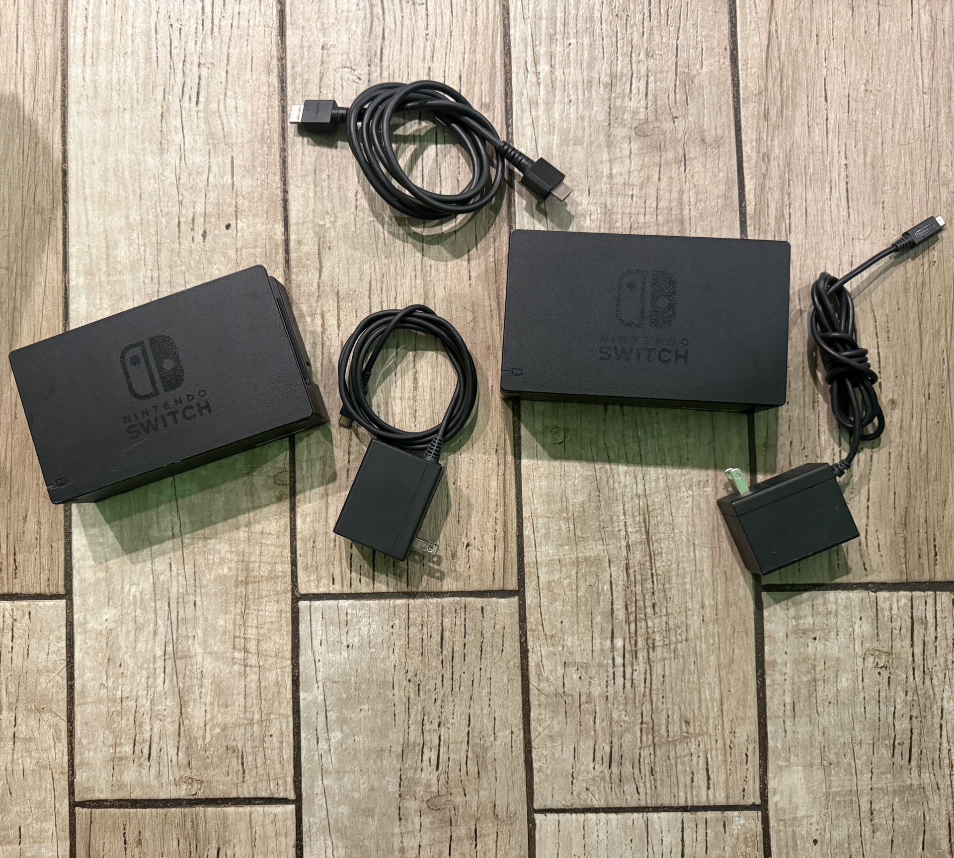 2 Nintendo Switch docks with official chargers and HDMI for Sale in ...