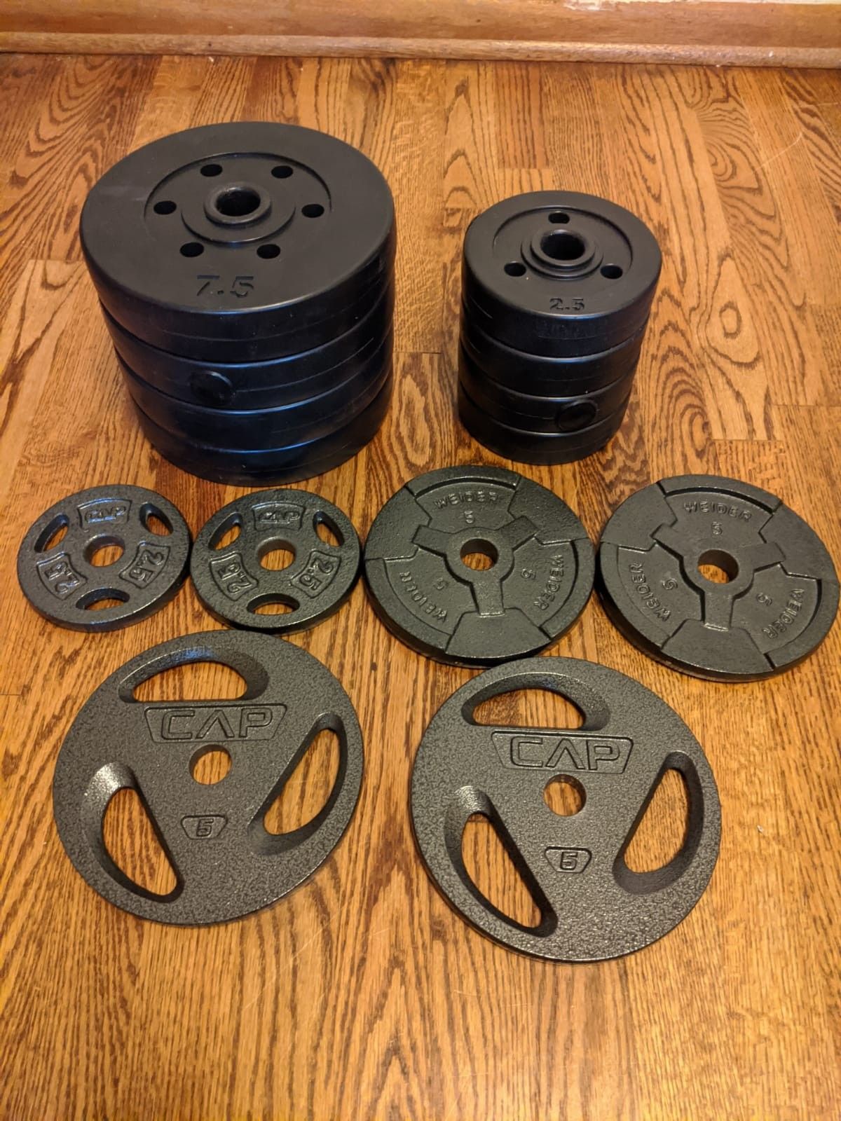 65 pounds of 1 inch standard weight plates. for Sale in Seattle, WA ...