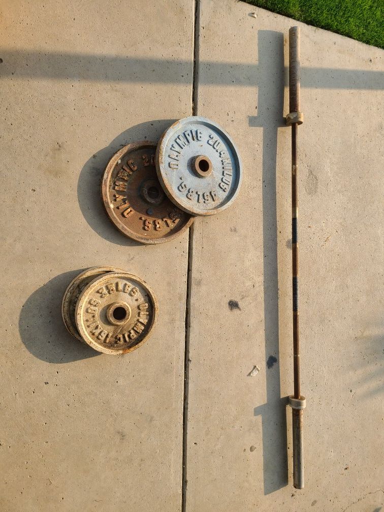 45 pound bar, 2(45) pound and 2(35) pound weights with it 300 Bucks ...