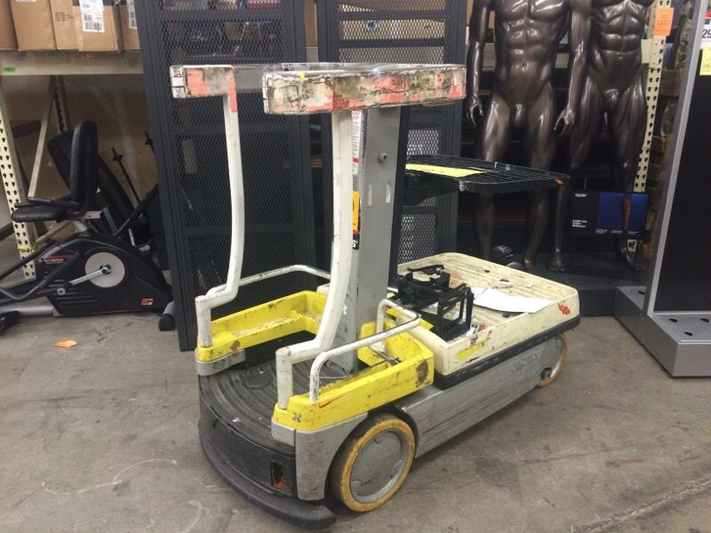 Crown Wave man lift available for sale. Used inside sports authority ...