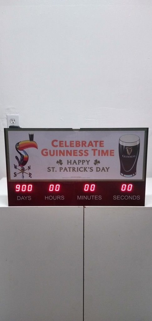 GUINNESS COUNTDOWN CLOCK . ( ALSO PLENTY OF NEON SIGNS / LIGHTS ...