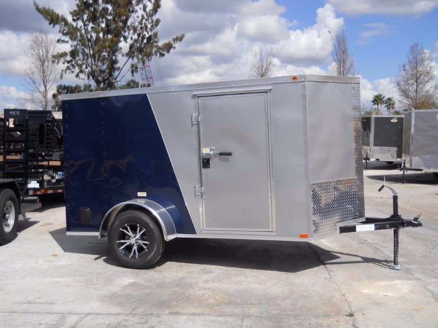 5x10 enclosed v-nose trailer. Ramp. Extra height. 32" side door. Radial ...