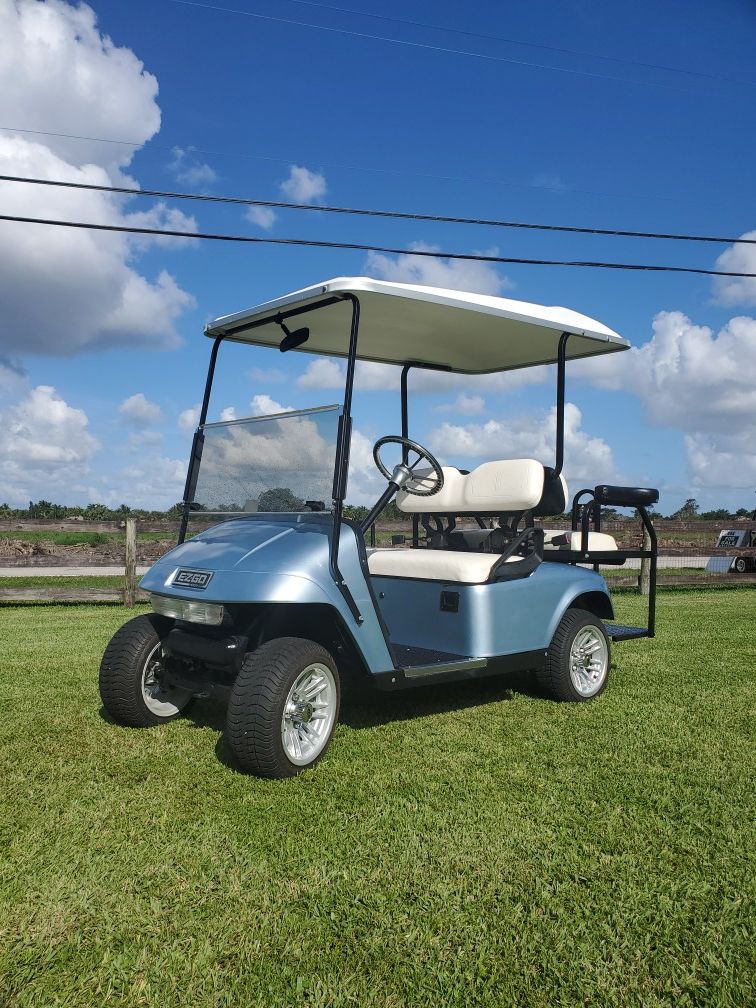 Ezgo golf cart, 4 passenger. Extend roof 12 inch wheels. for Sale in ...