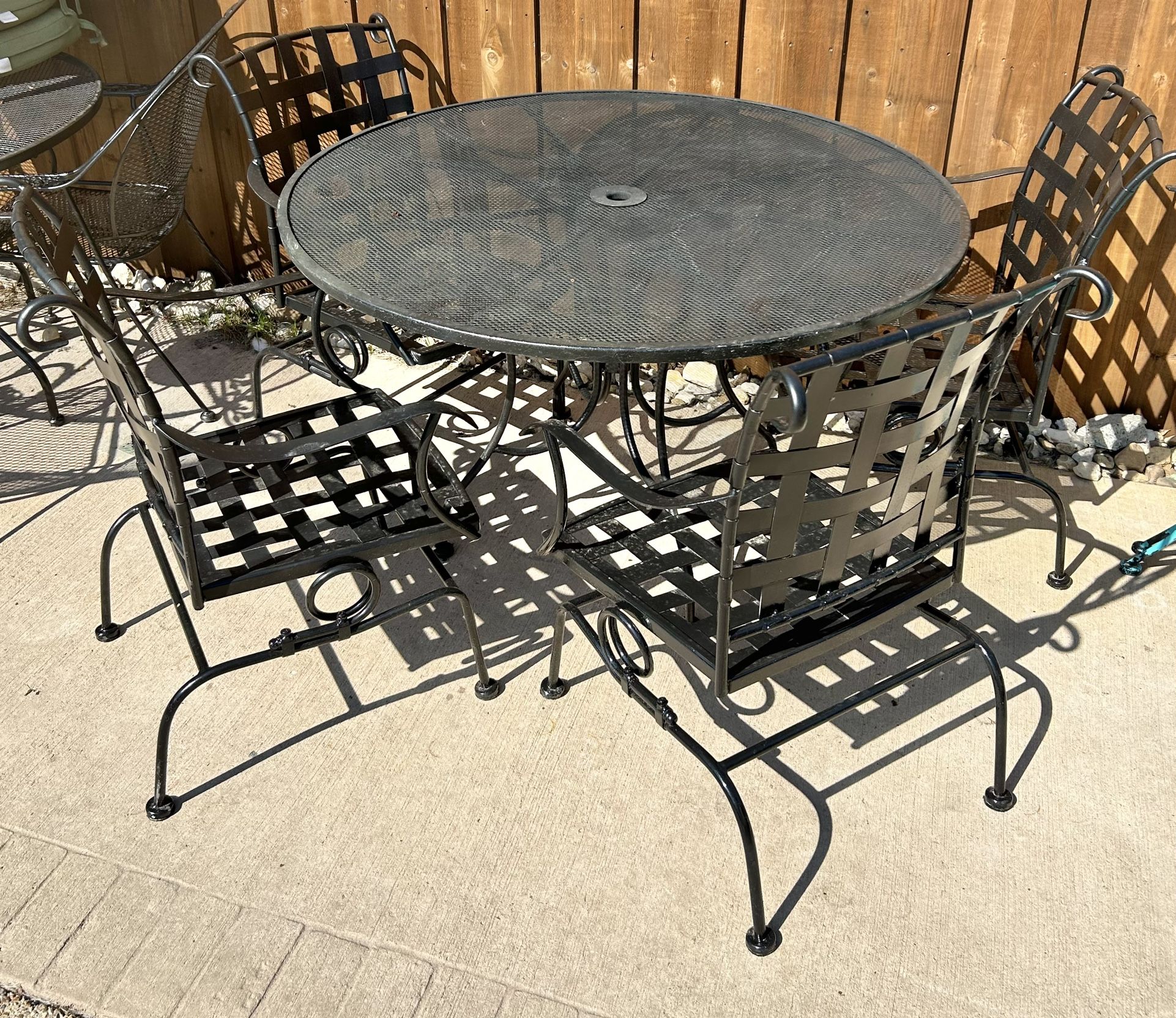 Wrought Iron Patio Table with 4 Rocker Chairs for Sale in Hickory Creek, TX - OfferUp