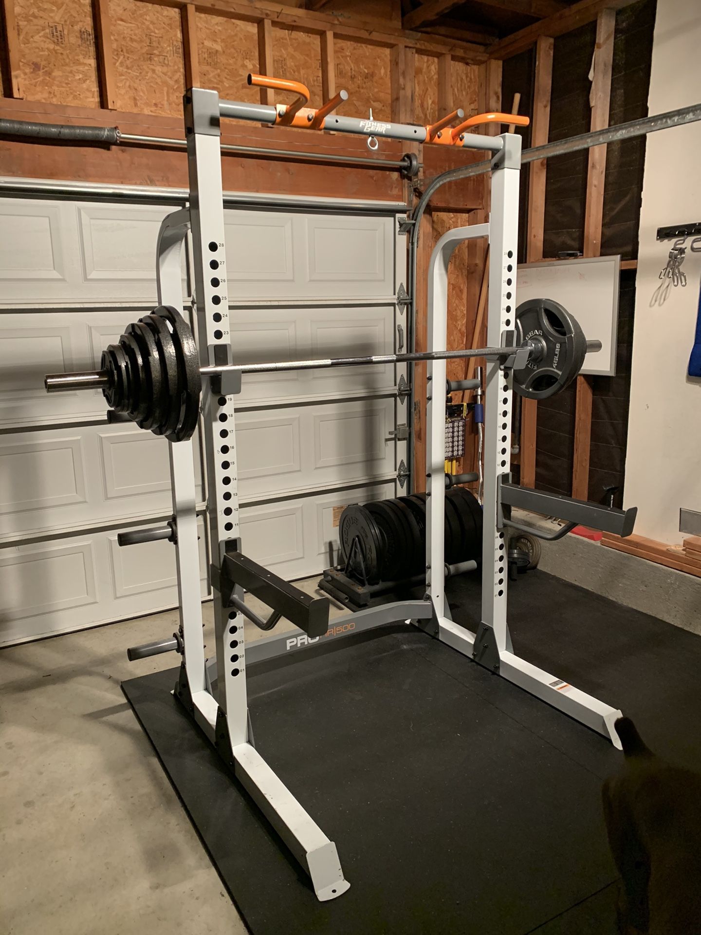 Full Squat Rack with a Multi-grip Pull-up bar and Olympic plate holders ...