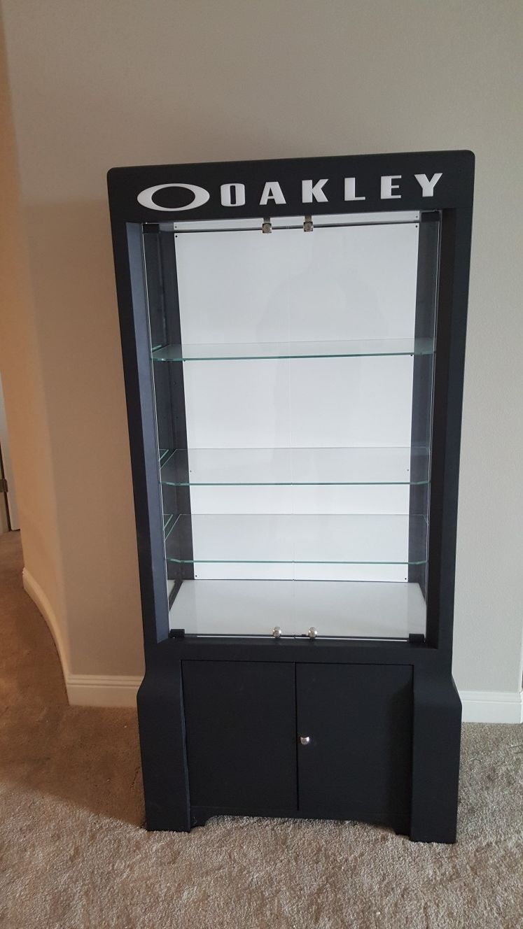 Oakley display cabinet with glass doors for Sale in San Ramon, CA - OfferUp