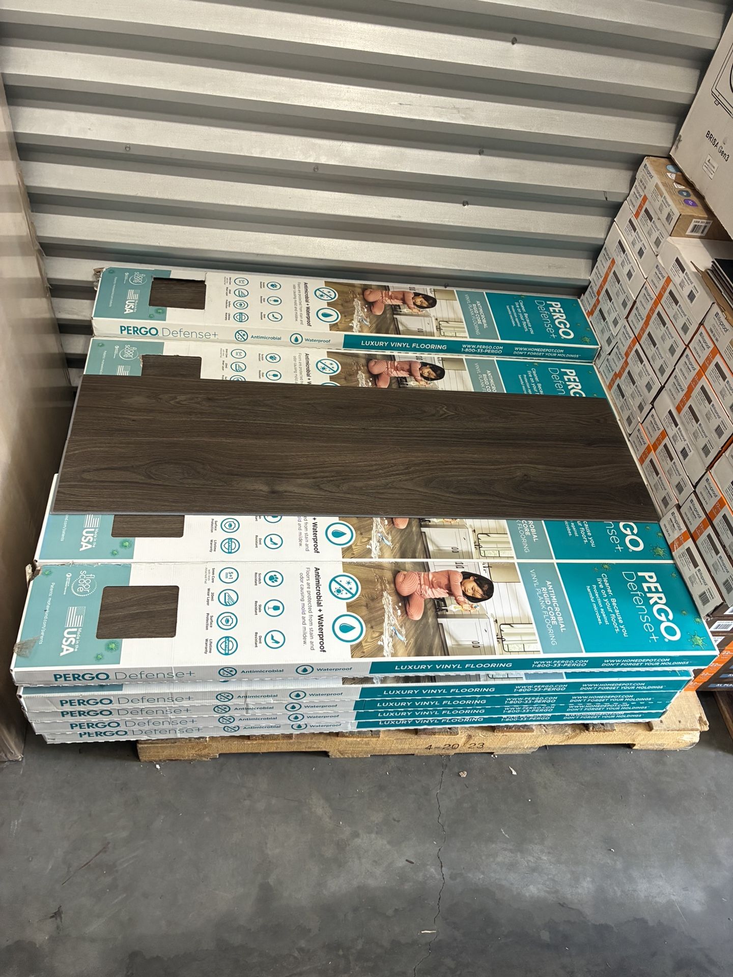 Pergo Defense+ Dark Chocolate Walnut Click Lock Waterproof Vinyl Plank ...