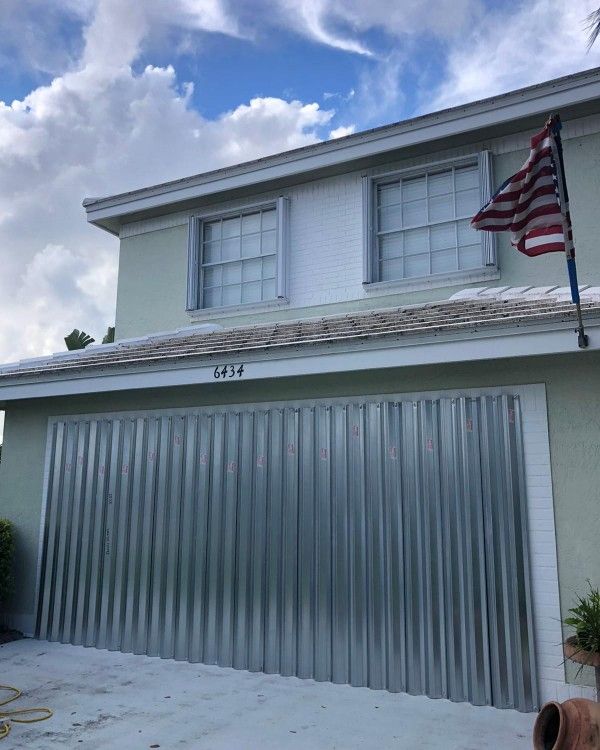 Code Approved Steel and Aluminum Hurricane Panels Shutters Miami-Dade ...