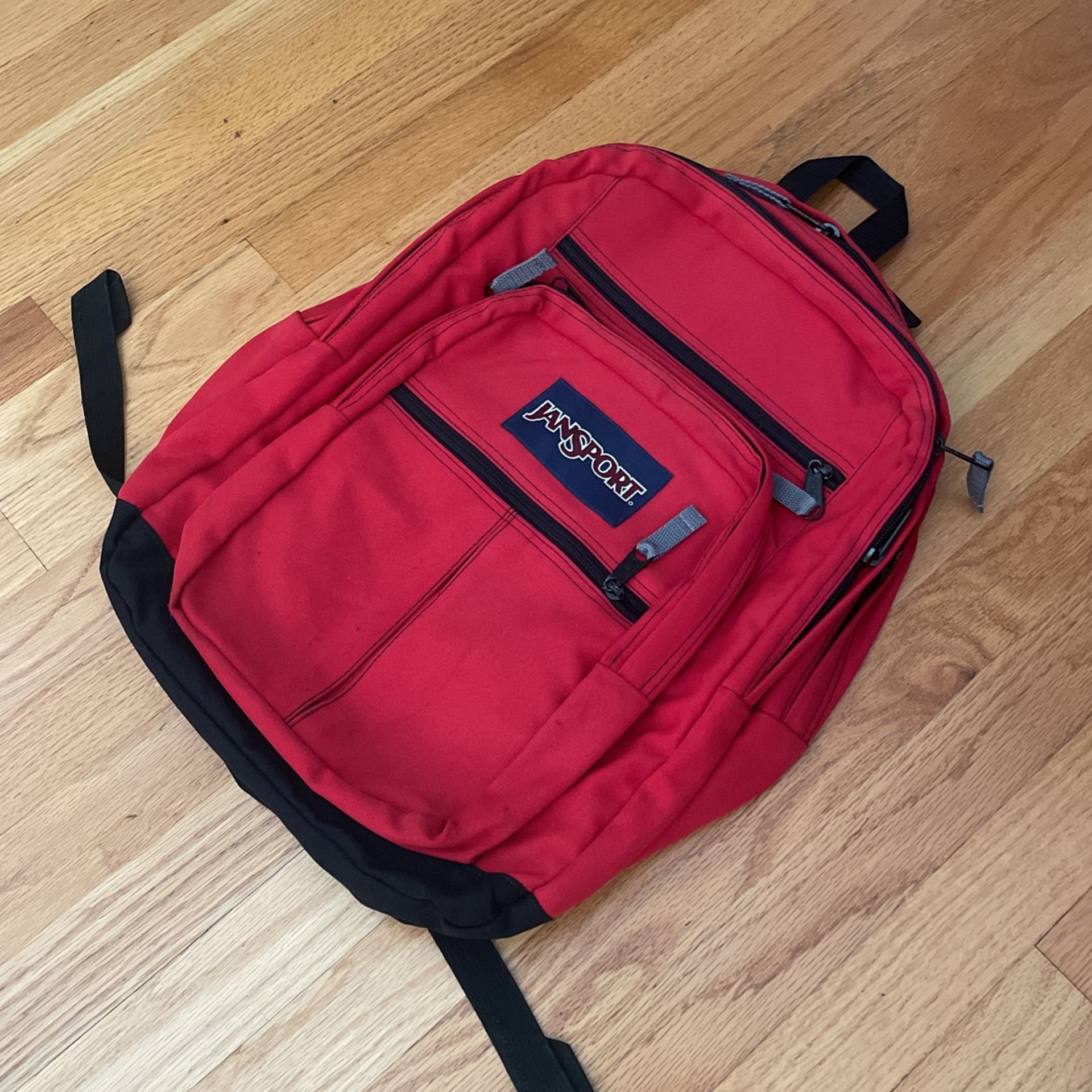 Red Jansport Backpacks