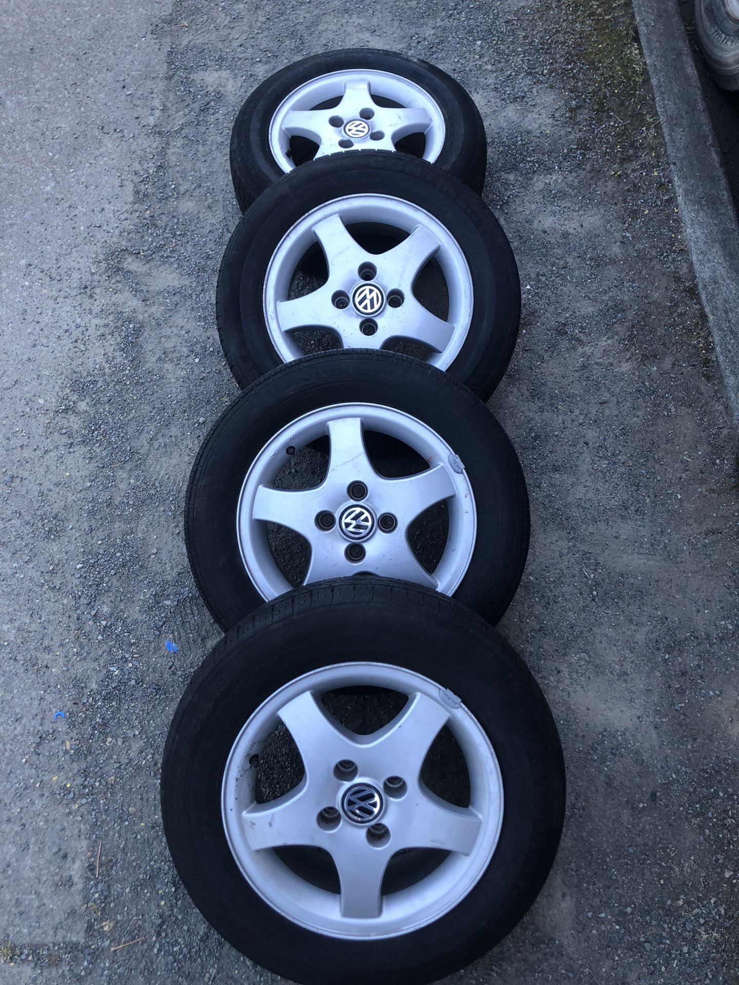Set of 4 VW 4 Lug Aluminum Rims w/ Tires for Sale in Tumwater, WA - OfferUp