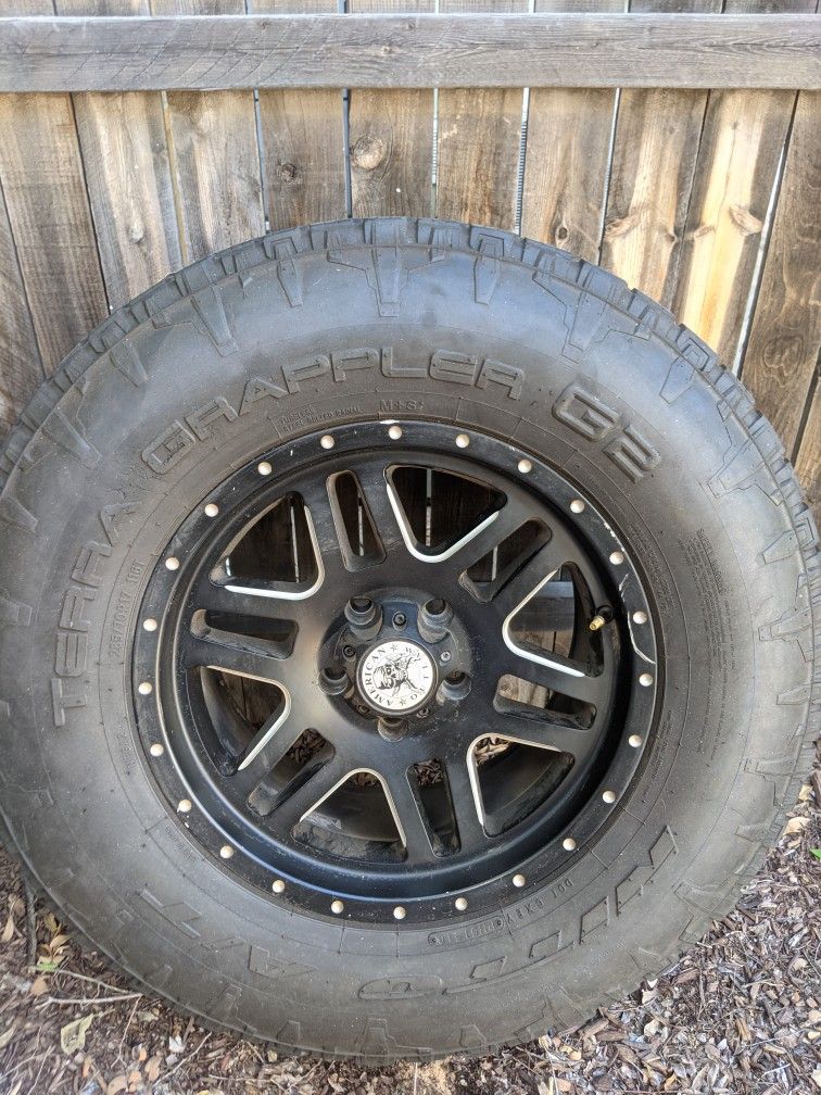 Four - 33" Nitto terra grappler Tires With 17in Rims for Sale in ...