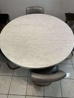 Torano marble deals oval dining