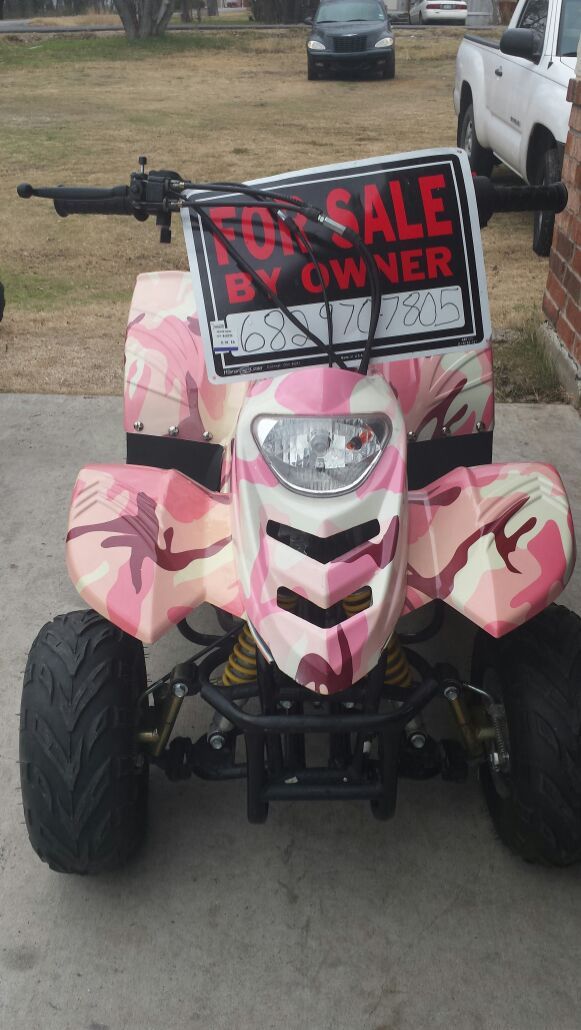 Big Pink Camo Four Wheeler