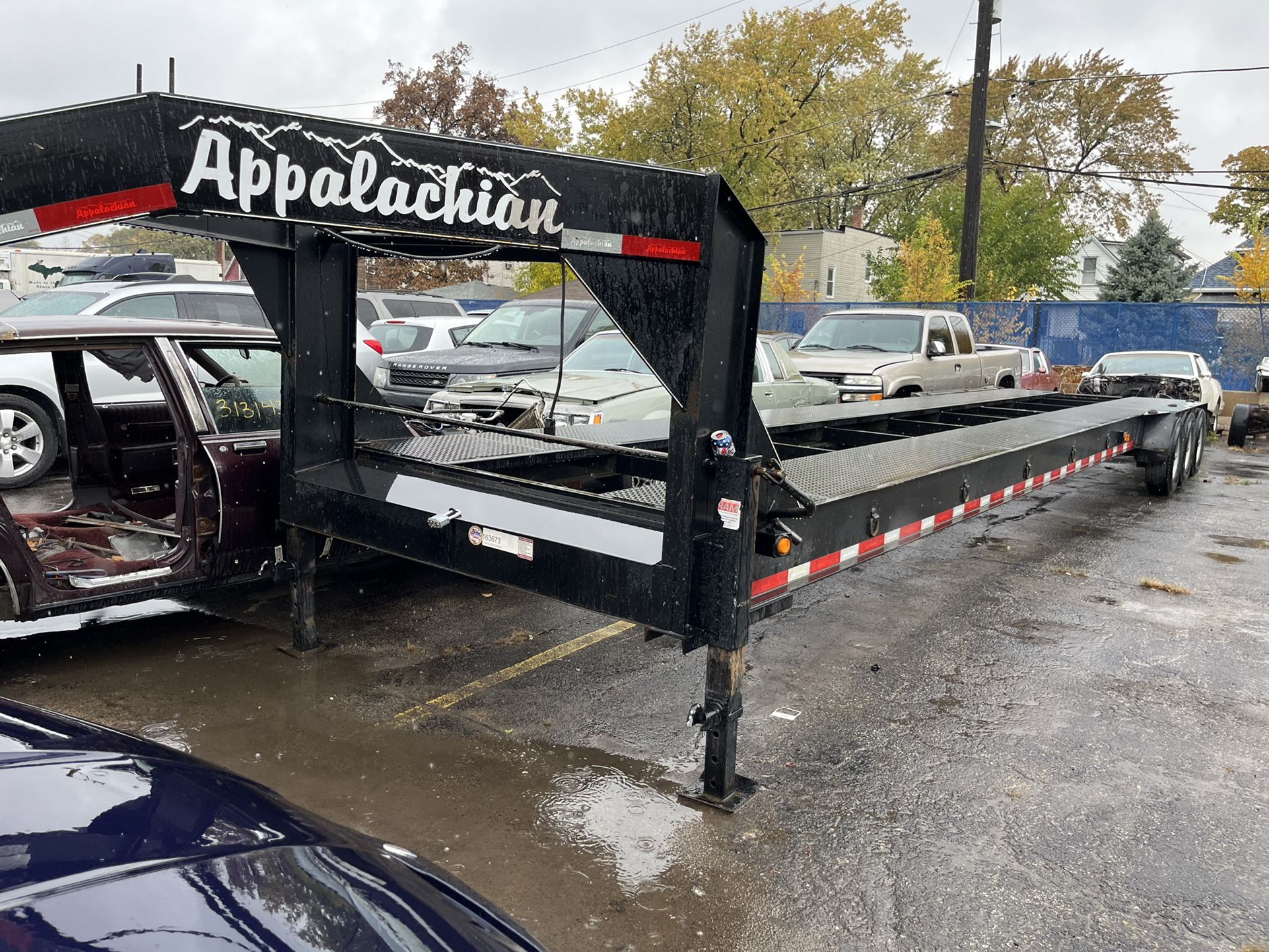 Three Car Carrier