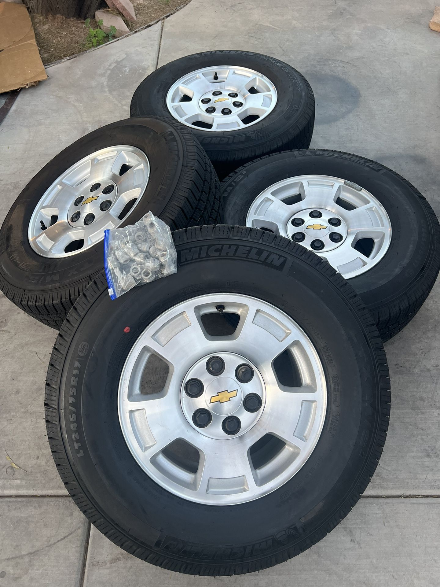 LT245/75/R17 MICHELIN TIRES & Chevy Silverado Wheels for Sale in ...