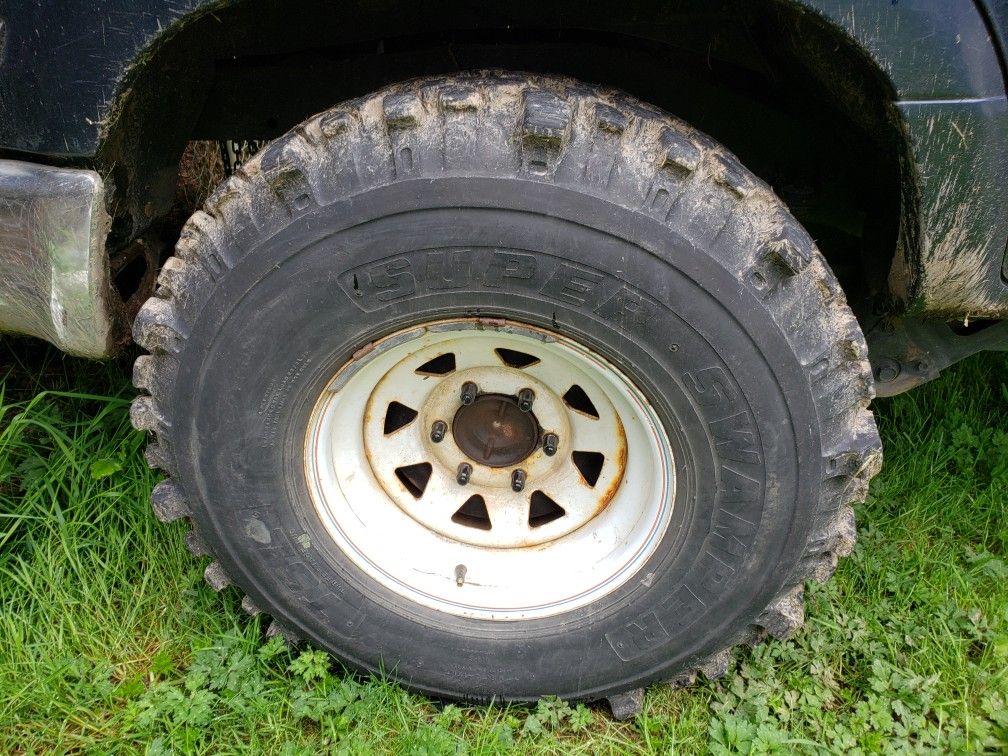 Full set of 4 34x9.5x15 lt super swamper tires on 6 lug Toyota rims for ...