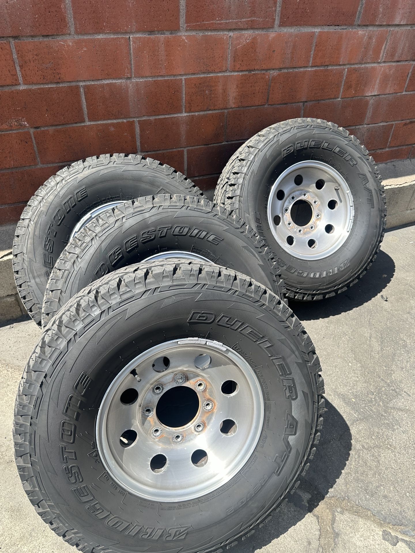 8x170 Wheels With 3 Center Caps 285/75/16 for Sale in Irvine, CA - OfferUp