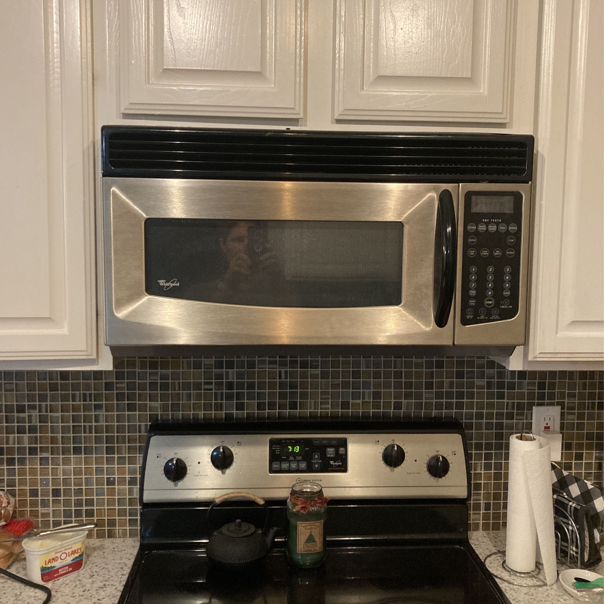 Stainless Steel Electric Stove And Microwave (whirlpool) And Black ...