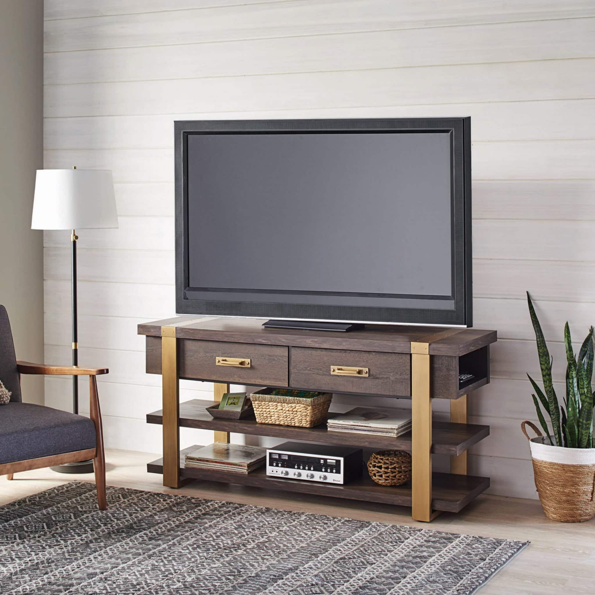 Dark brown wood and gold metal TV console with two drawers and two open ...